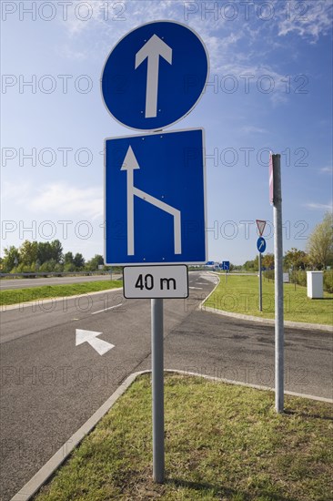 Traffic signs and highway access lanes at a rest stop - Photo12 ...
