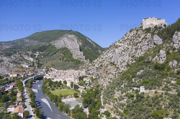 Aerial view of the mountain village Entreveaux with citadel in the Var ...