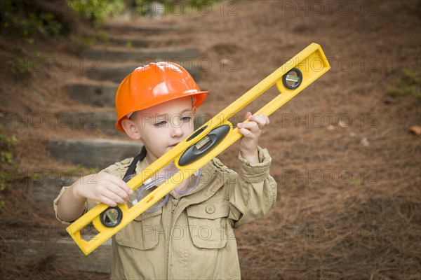 Happy adorable child boy with level - Photo12-imageBROKER-Andy Dean