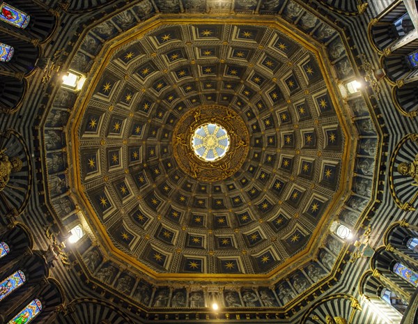 Central interior view of dome of Siena Cathedral Santa Maria Assunta in ...