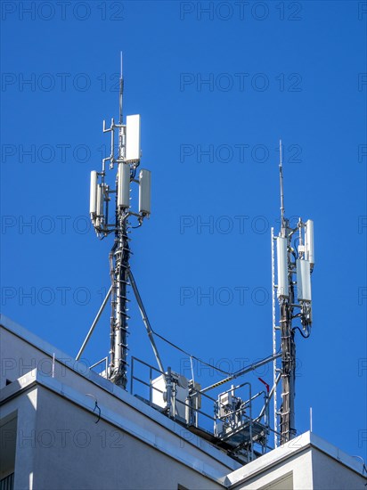 Mobile phone masts on a high-rise building - Photo12-imageBROKER ...