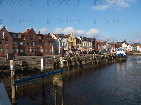 The inland harbour of Husum with colourful houses - Photo12-imageBROKER ...