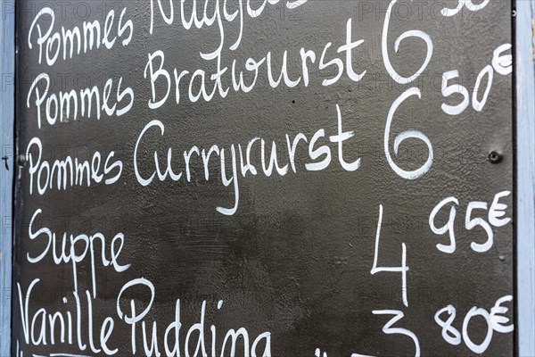 Price board at a snack bar - Photo12-imageBROKER-Karl-Heinz Spremberg