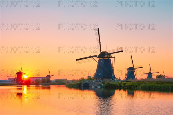 Netherlands rural landscape with windmills at famous tourist site ...