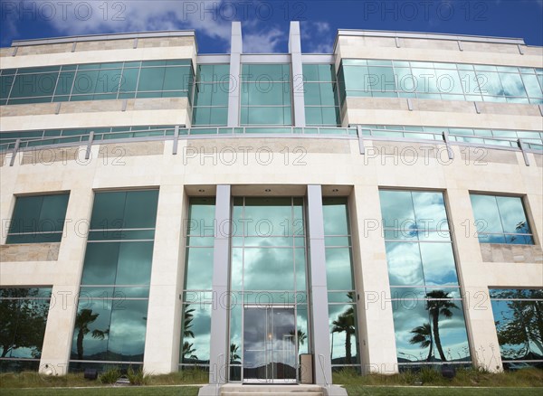 Dramatic corporate building with blue sky and clouds - Photo12 ...