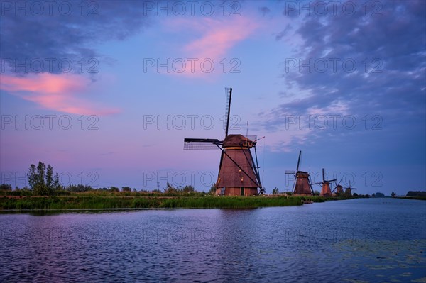 Netherlands rural lanscape with windmills at famous tourist site ...