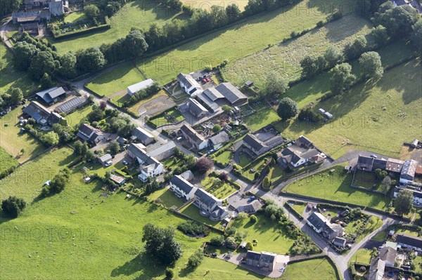 Aerial view of a rural hamlet and farm buildings - Photo12-imageBROKER ...