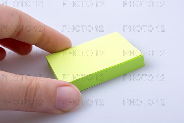 Post note office sticker for taking notes in hand - Photo12-imageBROKER ...