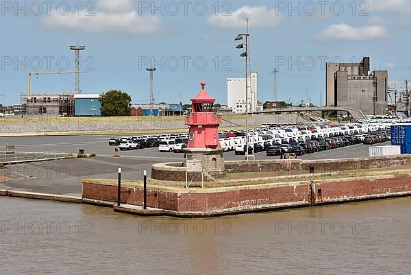 Car loading at Emden Westmole lighthouse, Emden - Photo12-imageBROKER ...