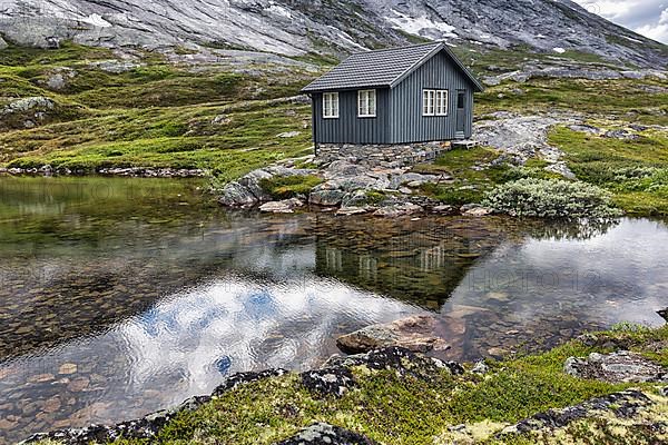 Small wooden hut reflected in the water - Photo12-imageBROKER-Angela to ...