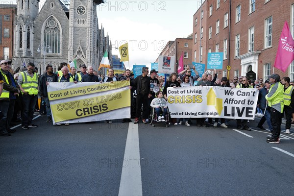 Participants in the Cost of Living Crisis protest march line up to lead ...