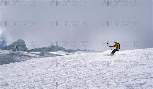 Ski tourers on the descent at Alpeiner Ferner - Photo12-imageBROKER ...