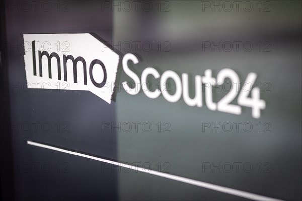 A logo of the ImmoScout24 company is located at a branch in Berlin ...