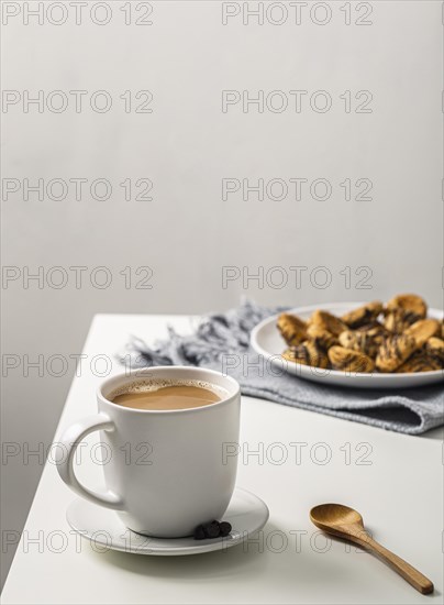 Coffee mug table with plate cookies - Photo12-imageBROKER-Oleksandr Latkun