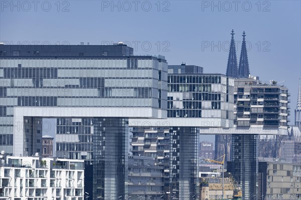 The 3 crane houses in Cologne's Rheinauhafen harbour in front of ...