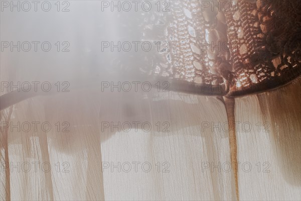 Soft light filters through a translucent object creating abstract ...