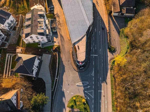 Details of an overpass with road traffic, captured from the air at dusk ...