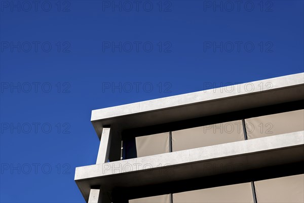 Corner Shape of a Modern Design Building Against Clear Blue Sky in a ...