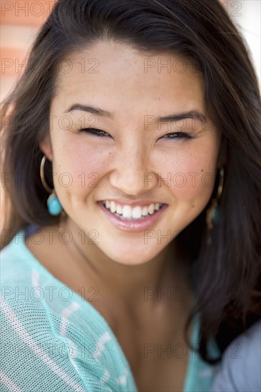 Japanese woman smiling - Photo12-Tetra Images-Inti St Clair